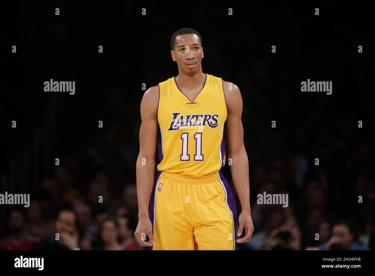 Los Angeles Lakers' Wesley Johnson watches during the first half of an ...