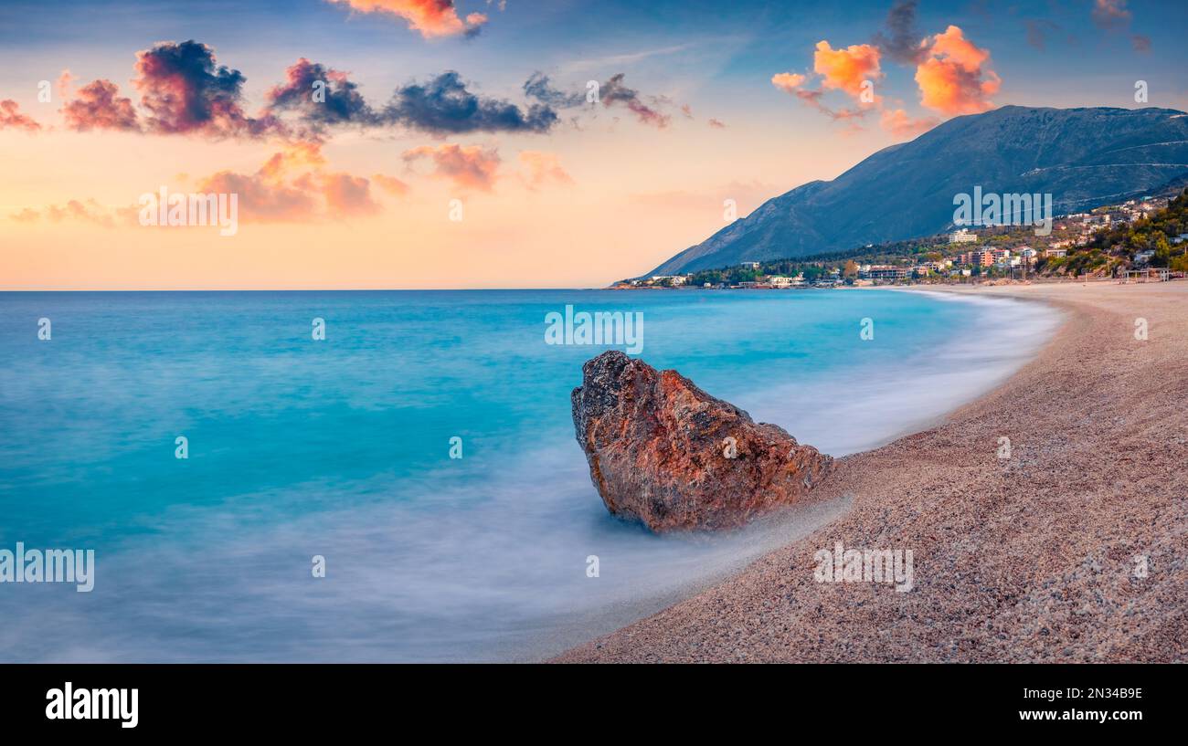 Spring sunrise in Dhermi town. Calm morning seascape of Adriatic sea ...