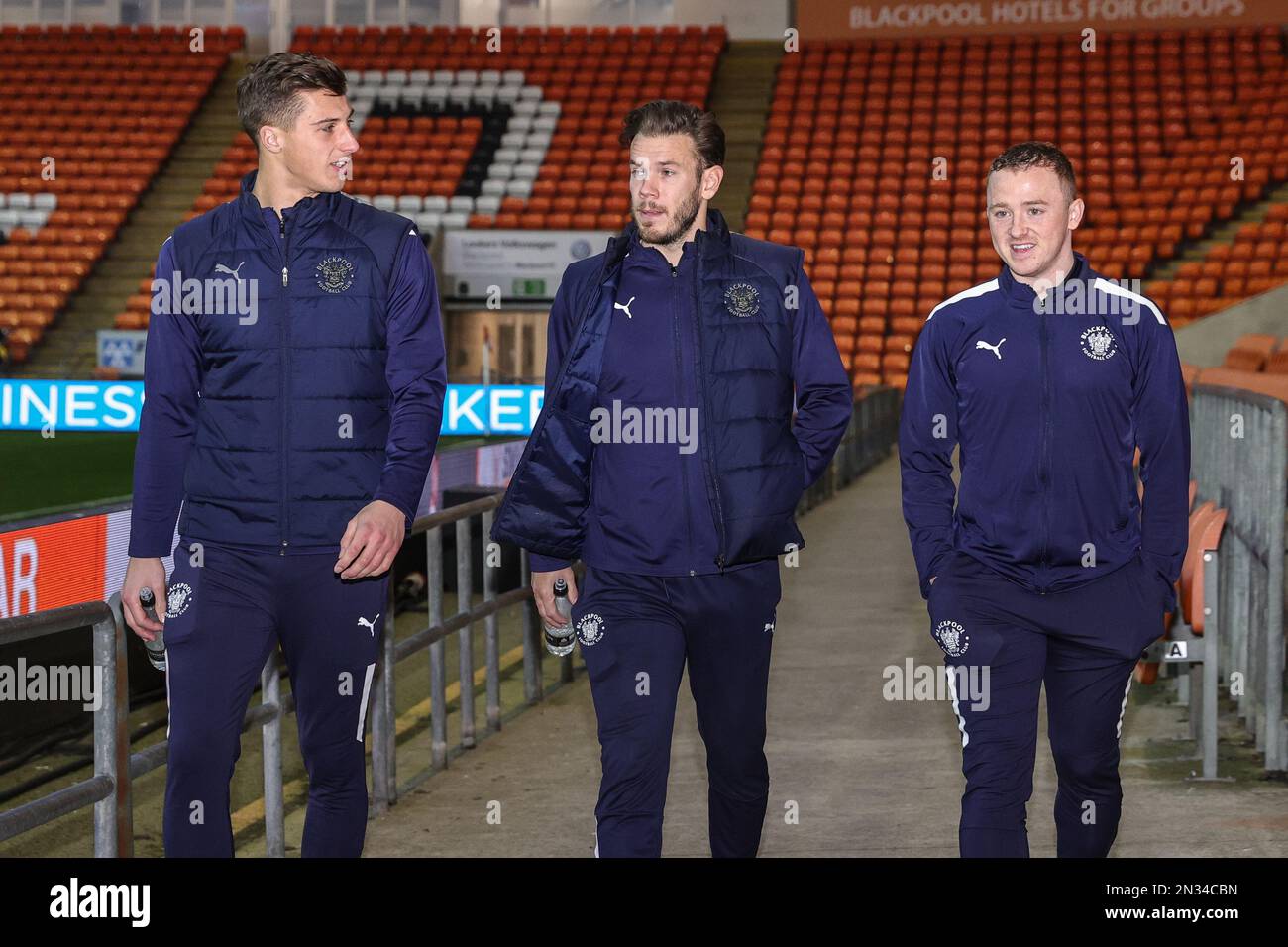 Stuart Moore #13 of Blackpool (L) Chris Maxwell #1 of Blackpool (C) and ...