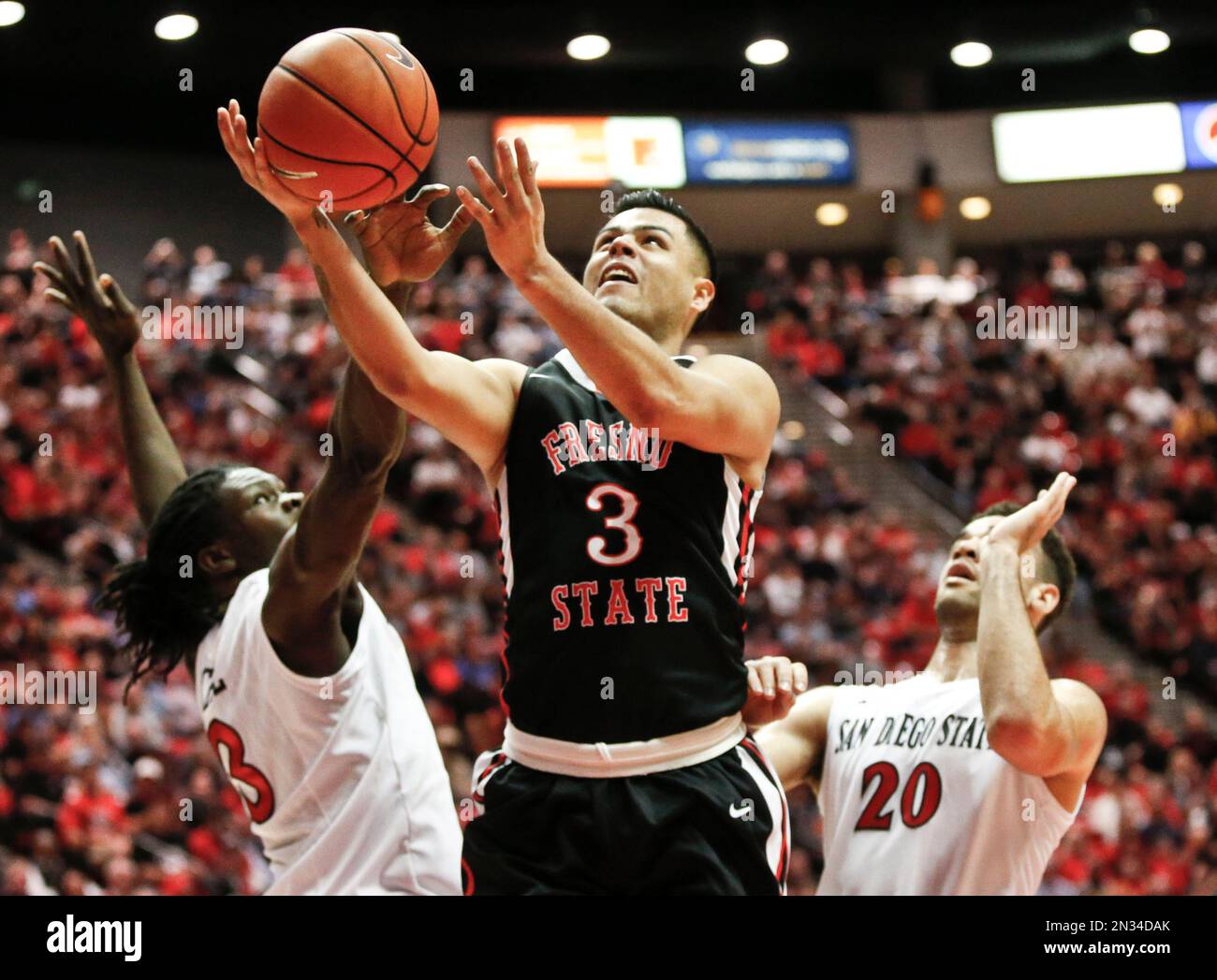 Fresno State guard Cezar Guerrero splits the defense of San Diego State ...