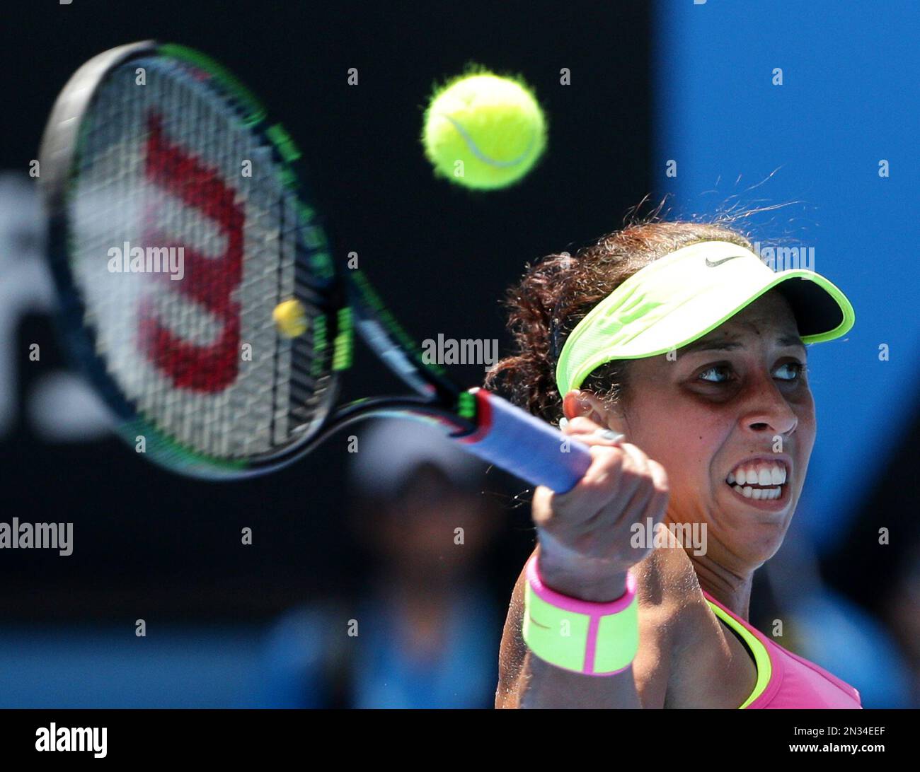 Madison Keys of the U.S. makes a forehand return to her compatriot ...