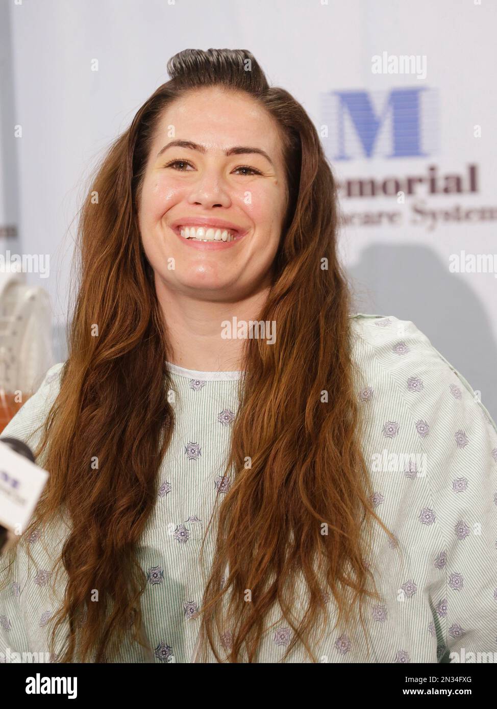 Lacy Webb, of Dallas, smiles as she recounts her story of being bitten ...