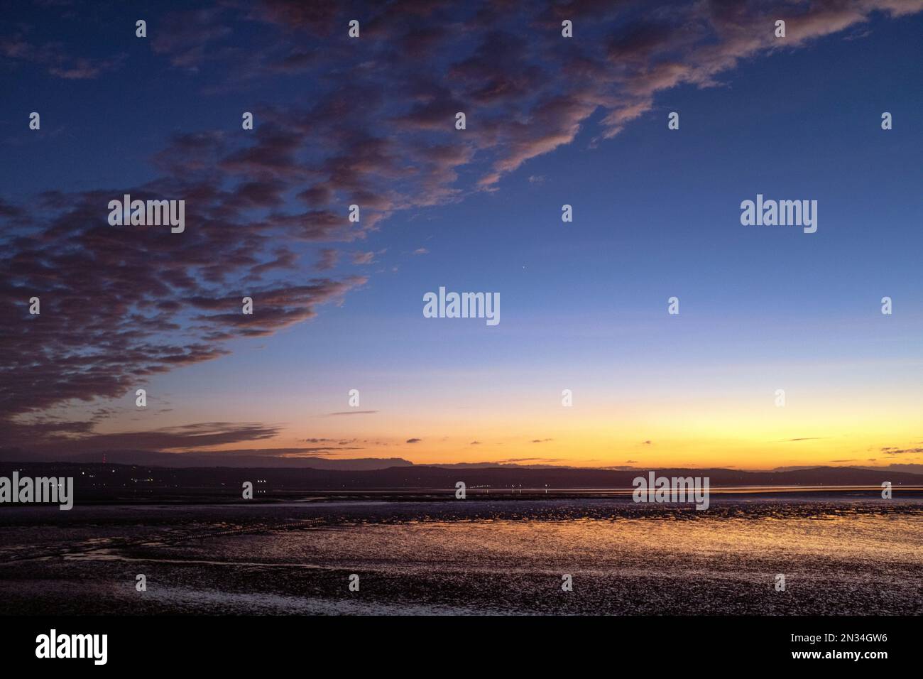 Sunset over the Dee Estuary, pictured from Cubbins Green, West Kirby ...