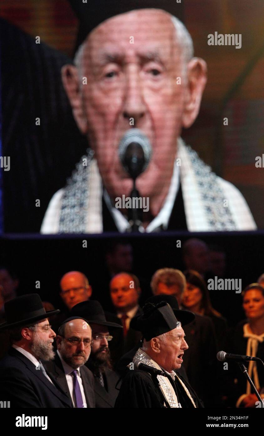 Jewish cantors sing in a tent raised at the entrance of the Birkenau ...