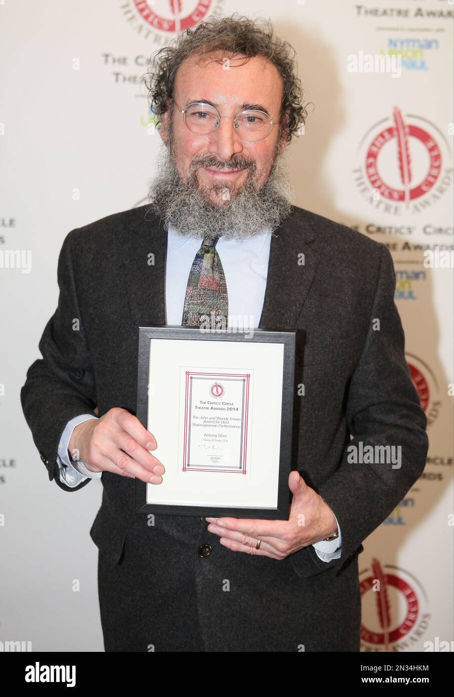 Actor Antony Sher poses for photographers after winning the best ...
