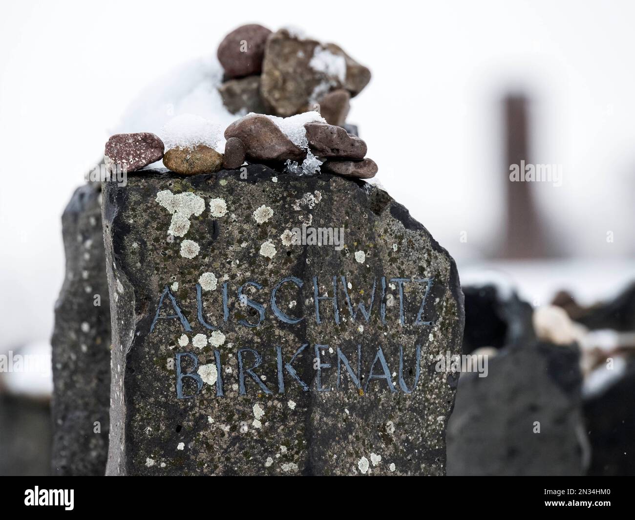 Stones lie on a Auschwitz-Birkenau memorial stone during the ...