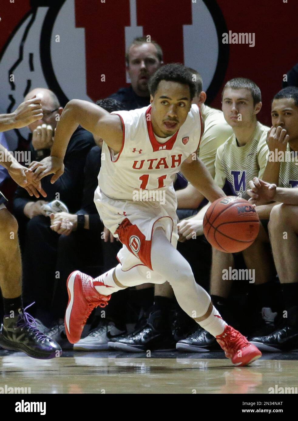 Utah guard Brandon Taylor (11) drives up court in the second half ...