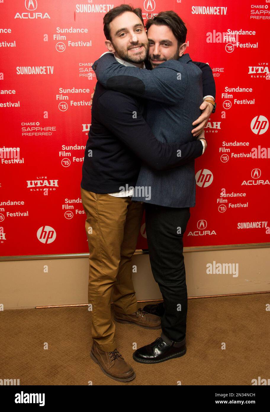 Directors Mike Luciano, left, and Phil Matarese embrace at the "Animals ...