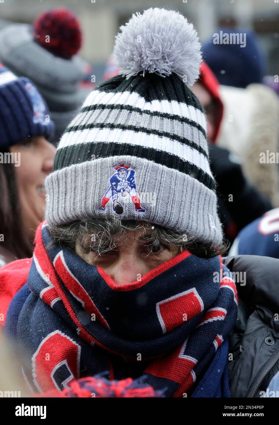 New England Patriots fan Sam Ketchum, of Lowell, Mass., is bundled up ...
