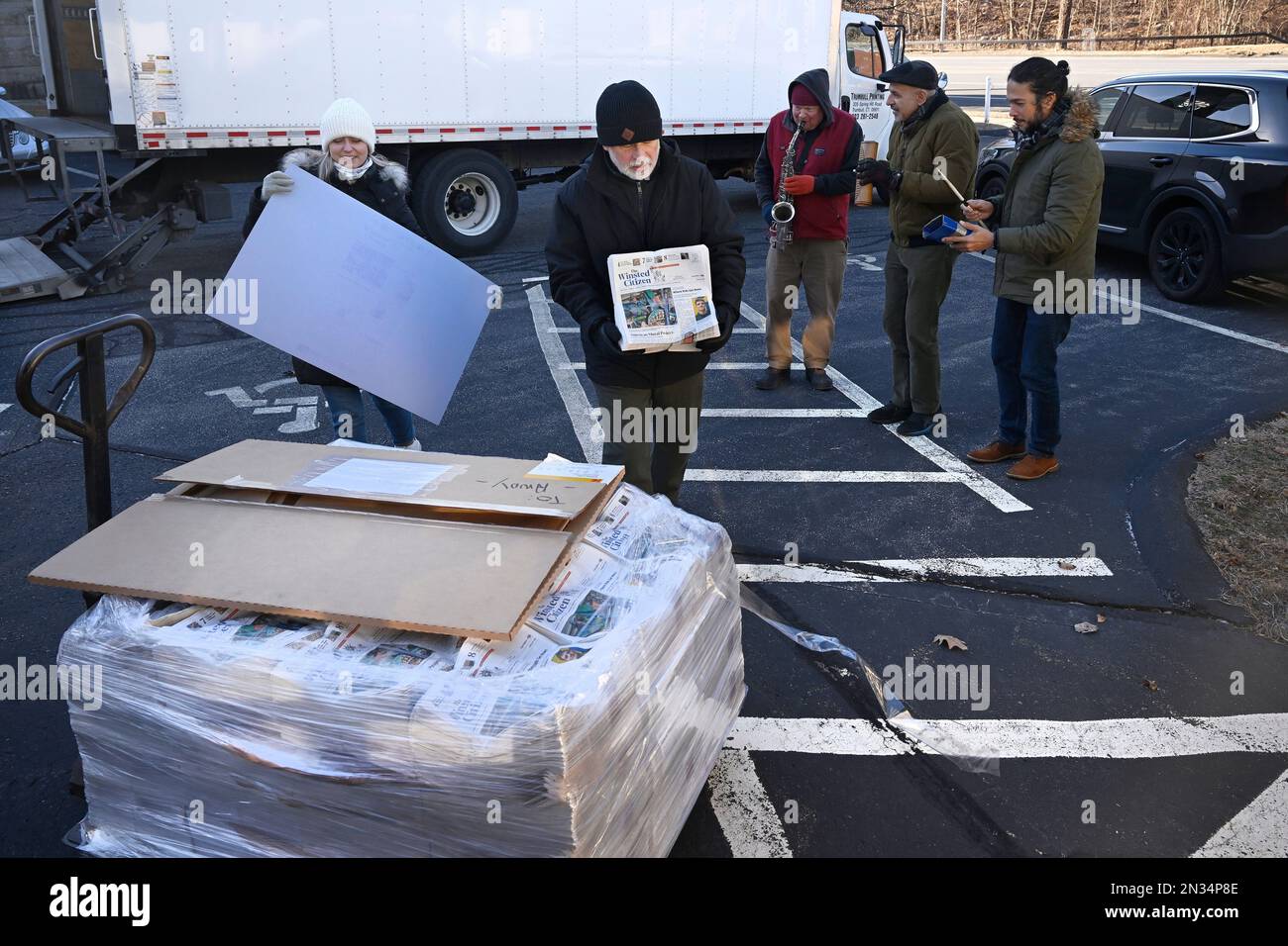 Andy Thibault, Editor and Publisher of The Winsted Citizen, carries the ...