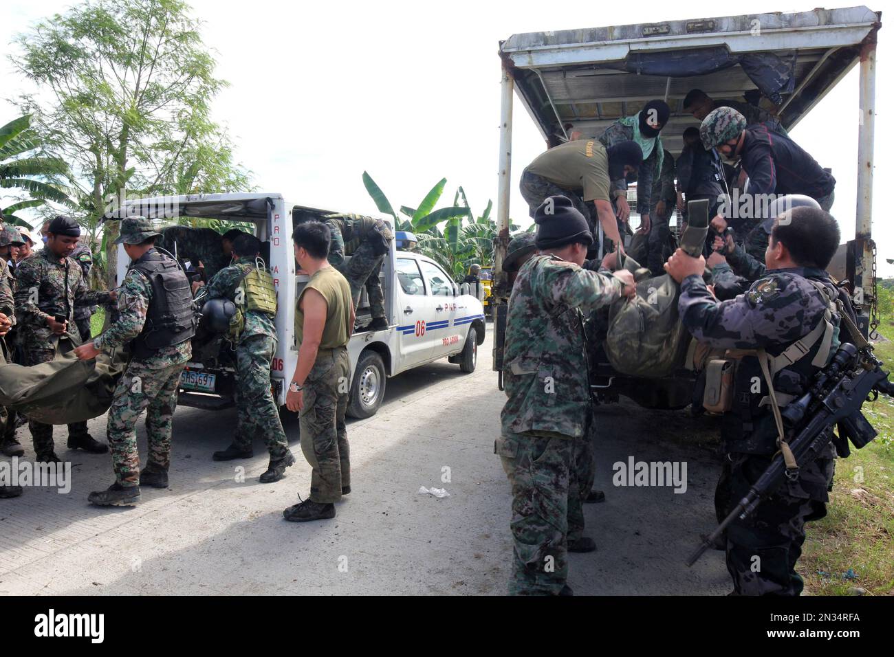 Members of the Philippine National Police Special Action Forces load ...