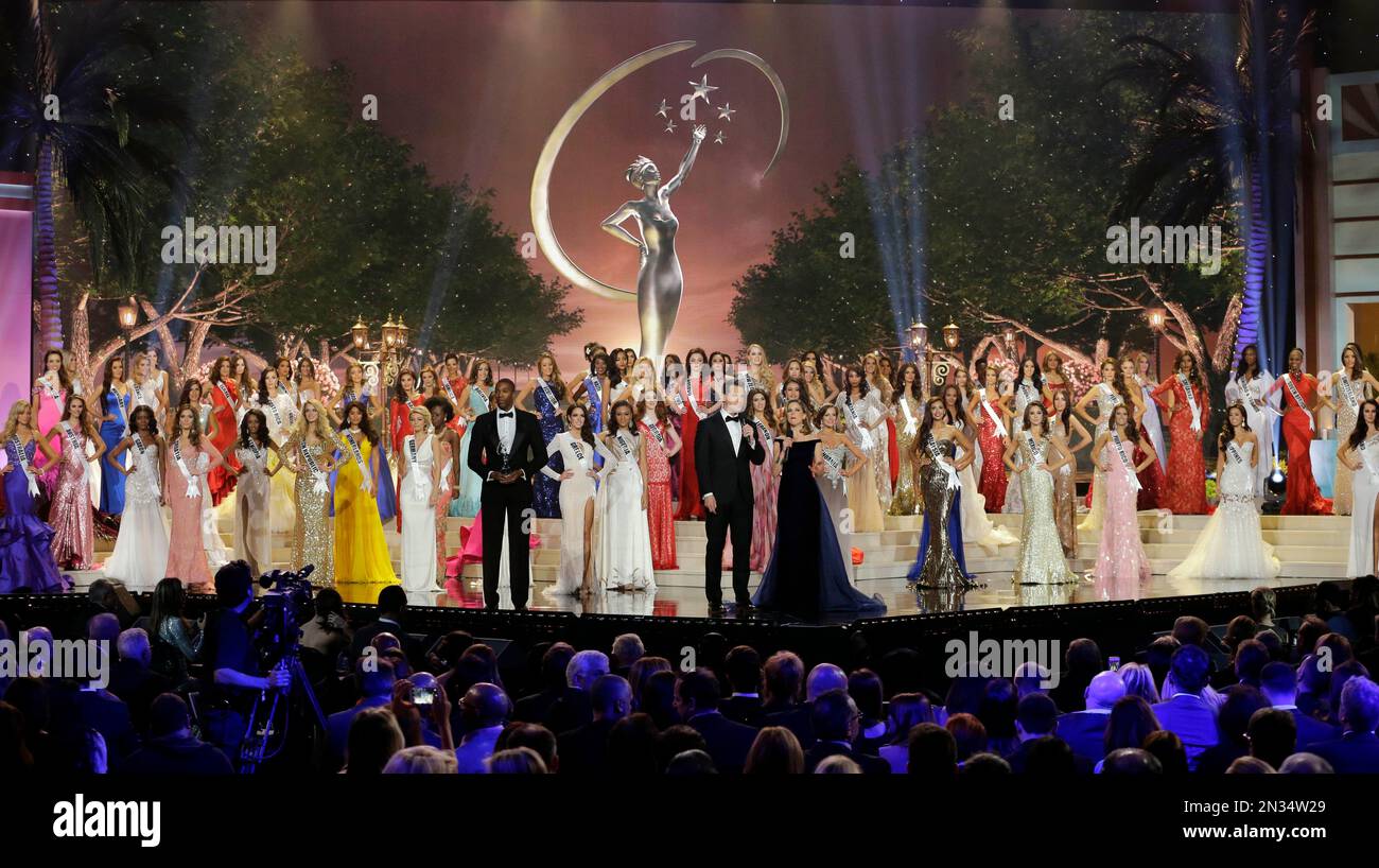 All the contestants pose on stage during the Miss Universe pageant in ...