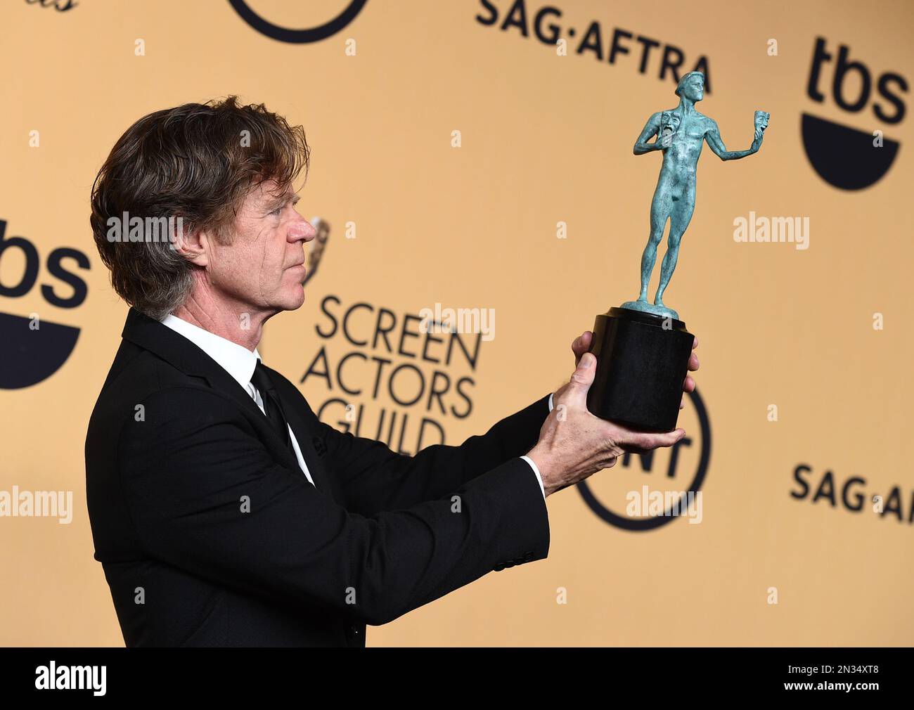 William H. Macy poses in the press room with the award for outstanding ...