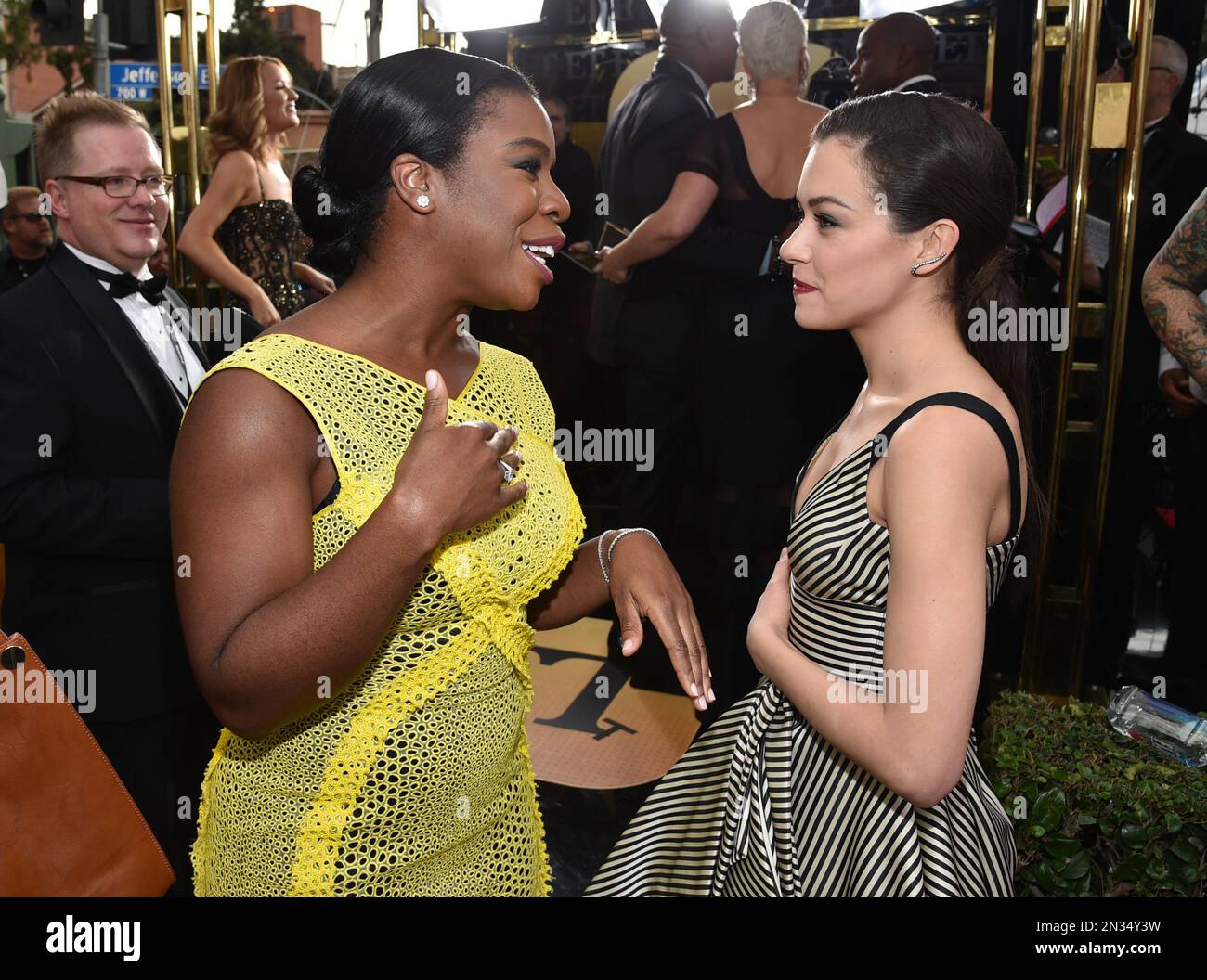 Uzo Aduba, left, and Tatiana Maslany arrives at the 21st annual Screen ...