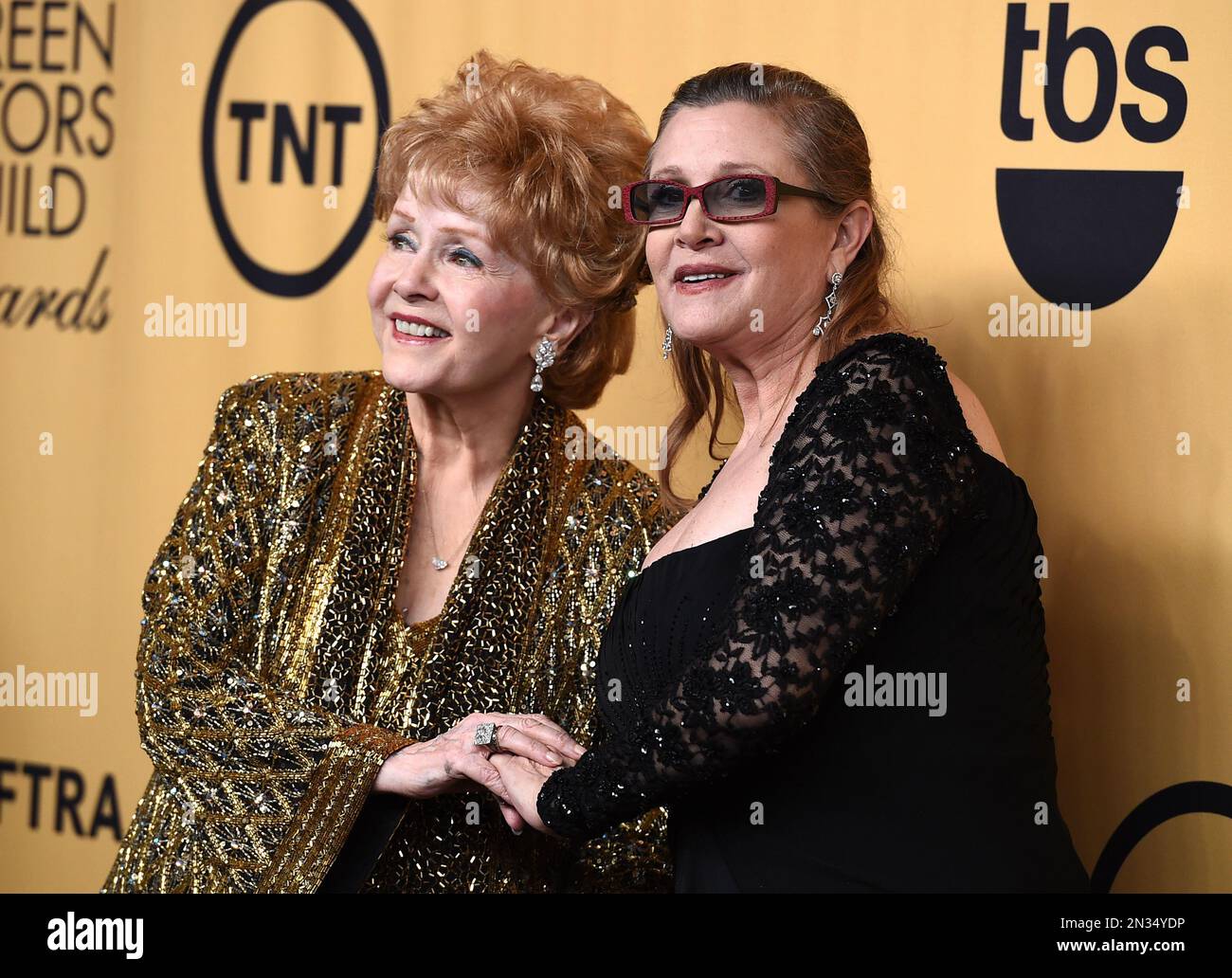 Debbie Reynolds, winner of the Screen Actors Guild lifetime award, left ...
