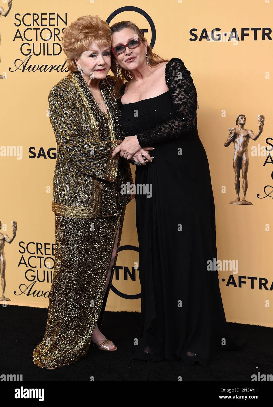 Debbie Reynolds, winner of the Screen Actors Guild lifetime award, left ...