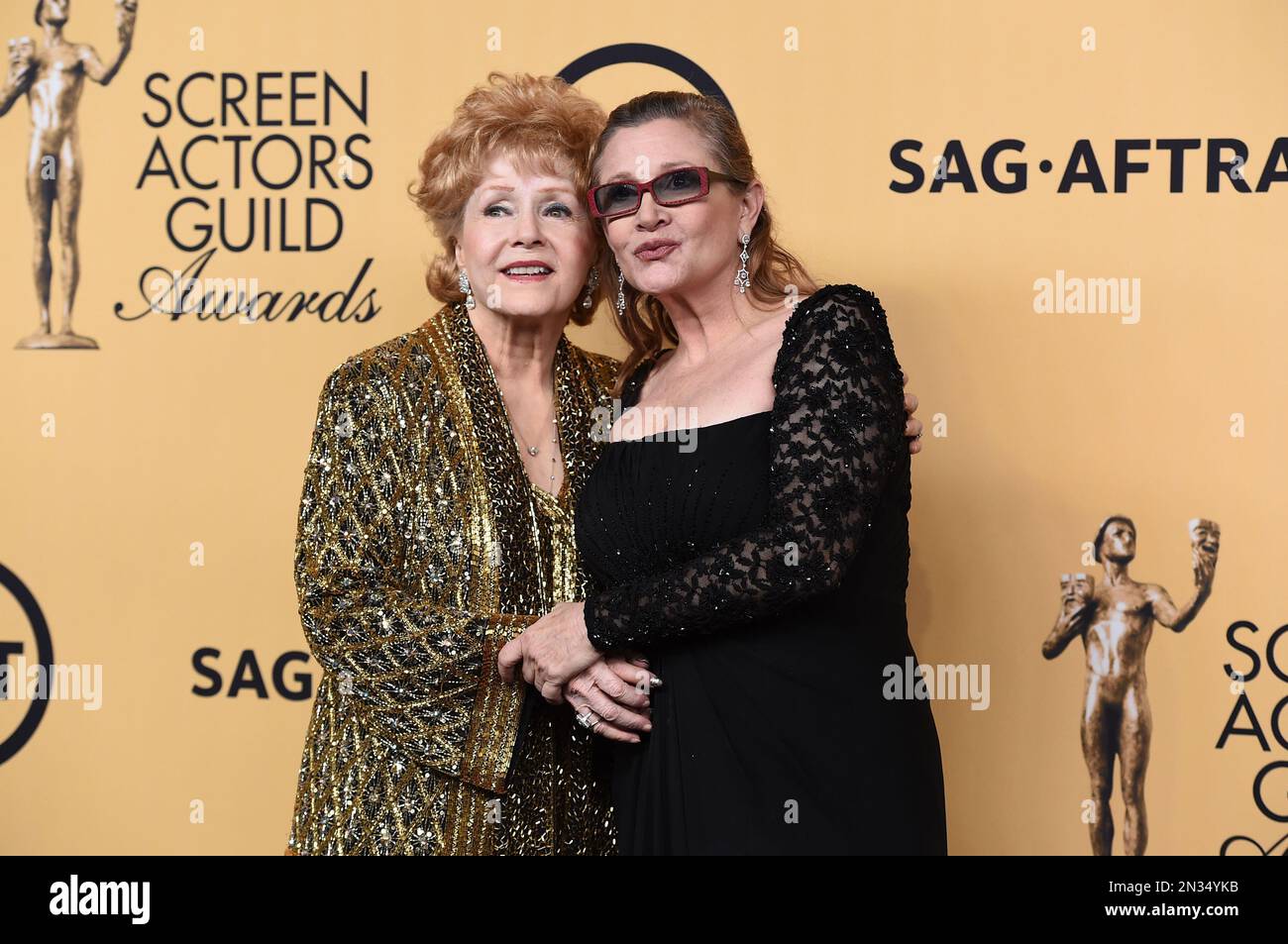 Debbie Reynolds, winner of the Screen Actors Guild lifetime award, left ...