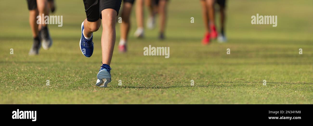 Running children, young athletes run in a kids run race, running on ...