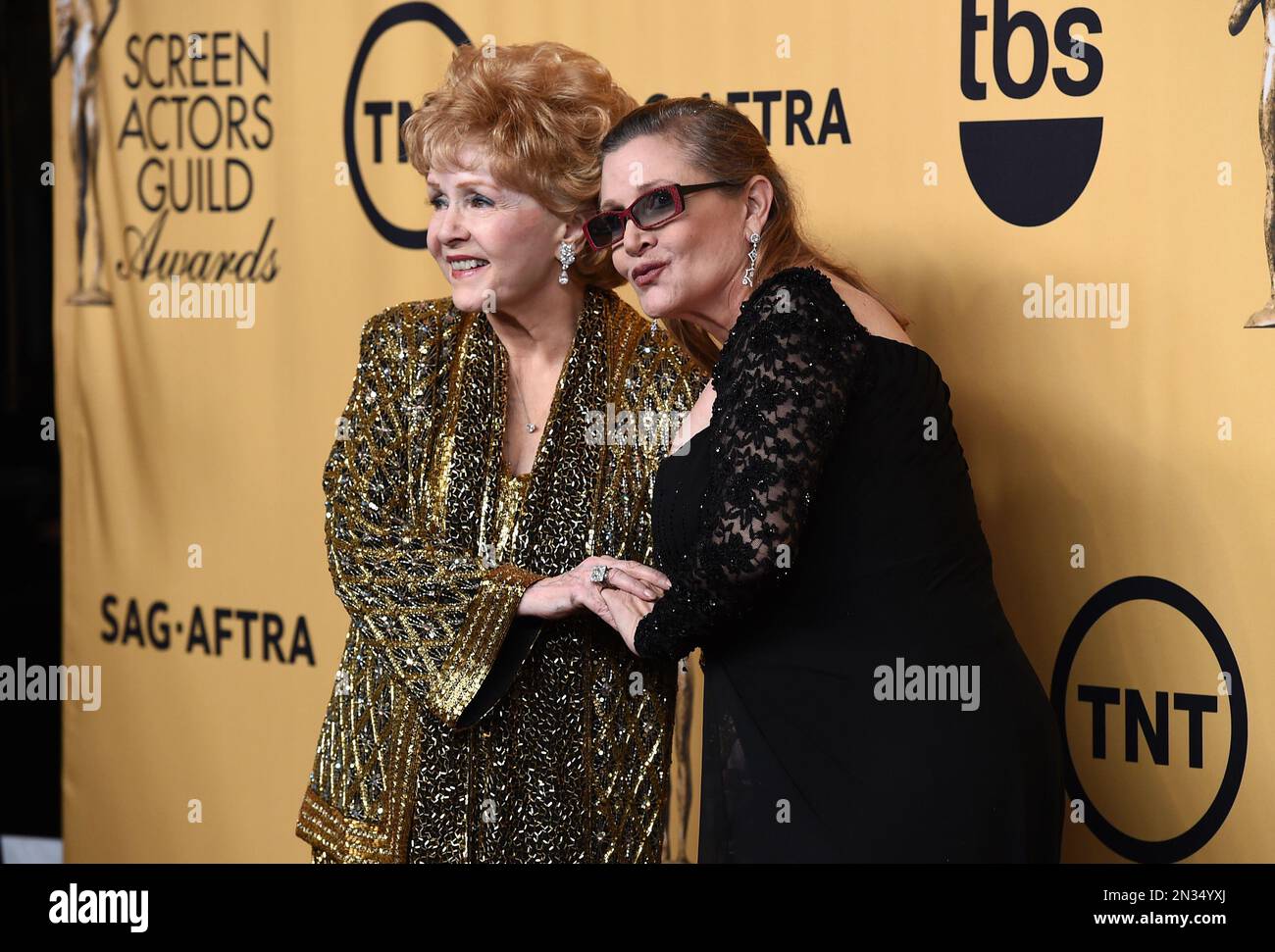 Debbie Reynolds, winner of the Screen Actors Guild lifetime award, left ...