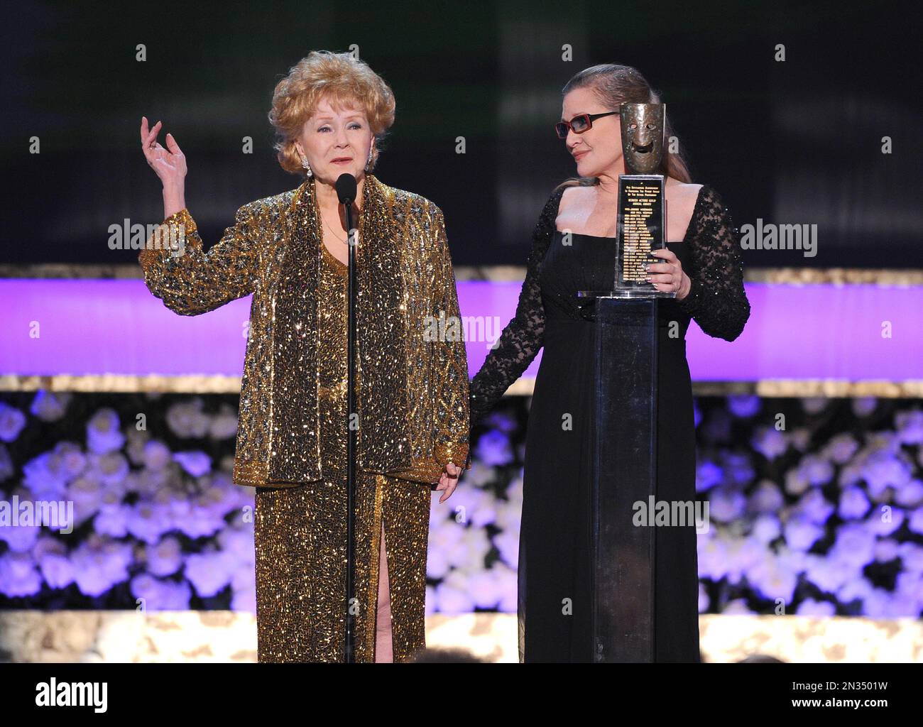Carrie Fisher, right, presents Debbie Reynolds with the Screen Actors ...