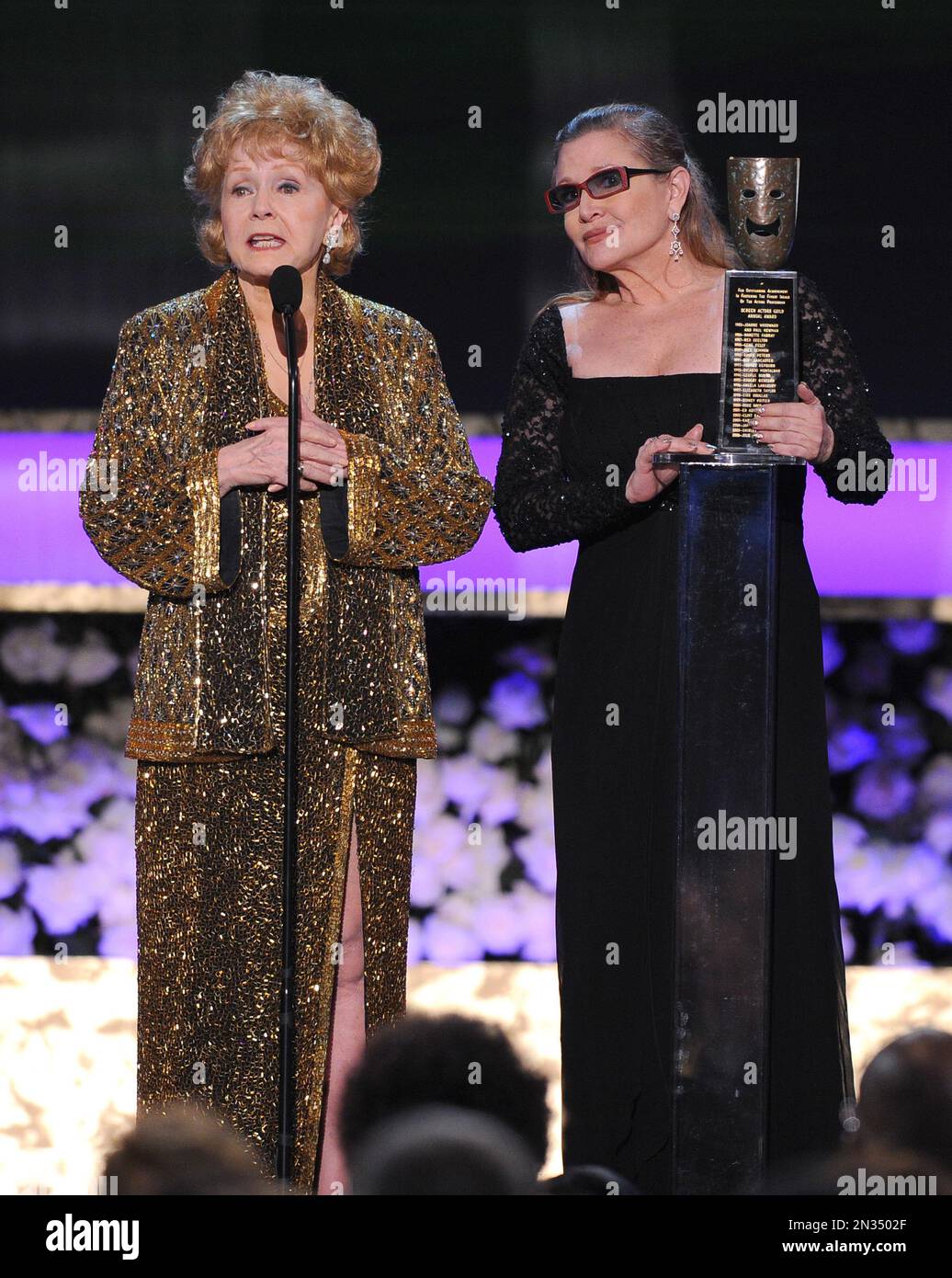 Carrie Fisher, right, presents Debbie Reynolds with the Screen Actors ...
