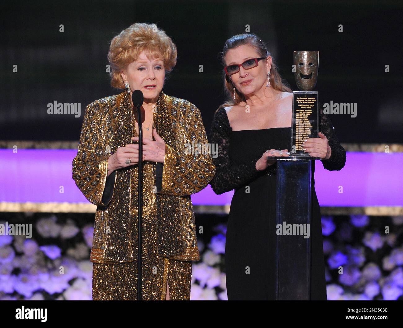 Carrie Fisher, right, presents Debbie Reynolds with the Screen Actors ...