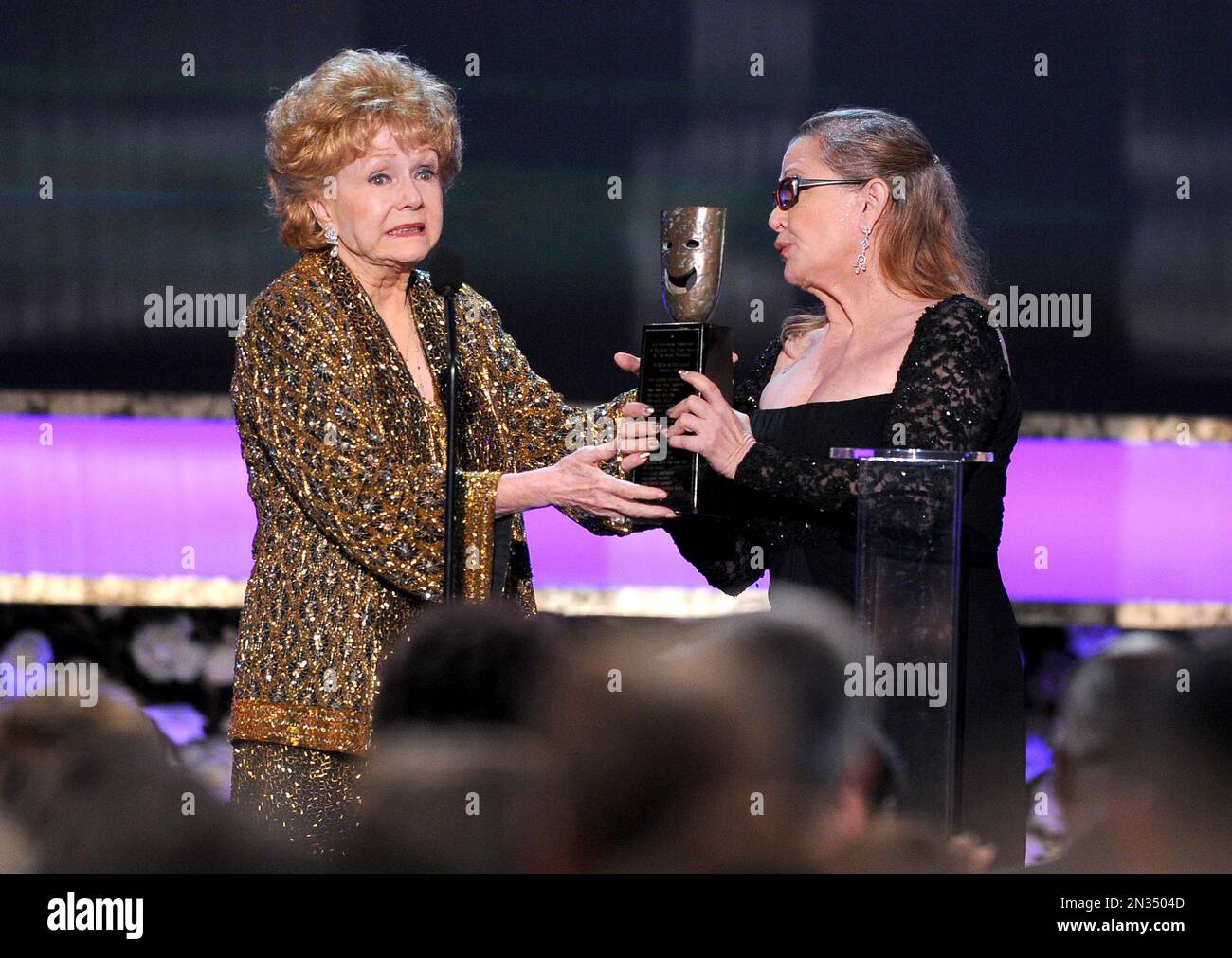 Carrie Fisher, right, presents Debbie Reynolds with the Screen Actors ...