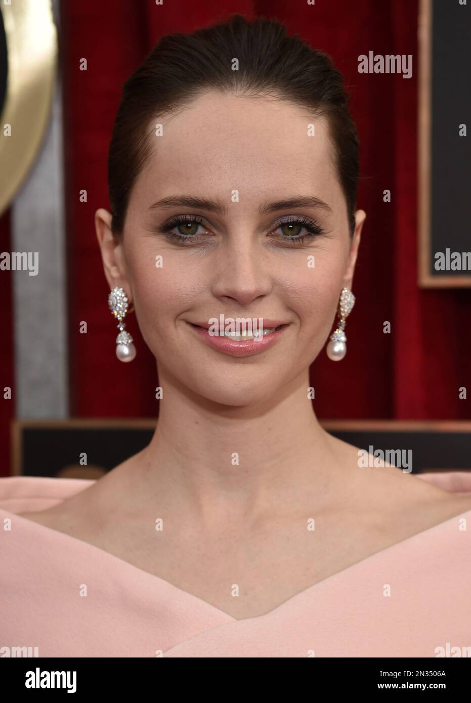 Felicity Jones arrives at the 21st annual Screen Actors Guild Awards at ...