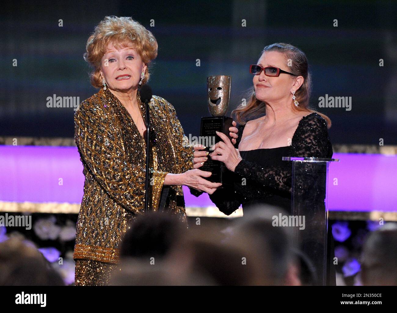 Carrie Fisher, right, presents Debbie Reynolds with the Screen Actors ...