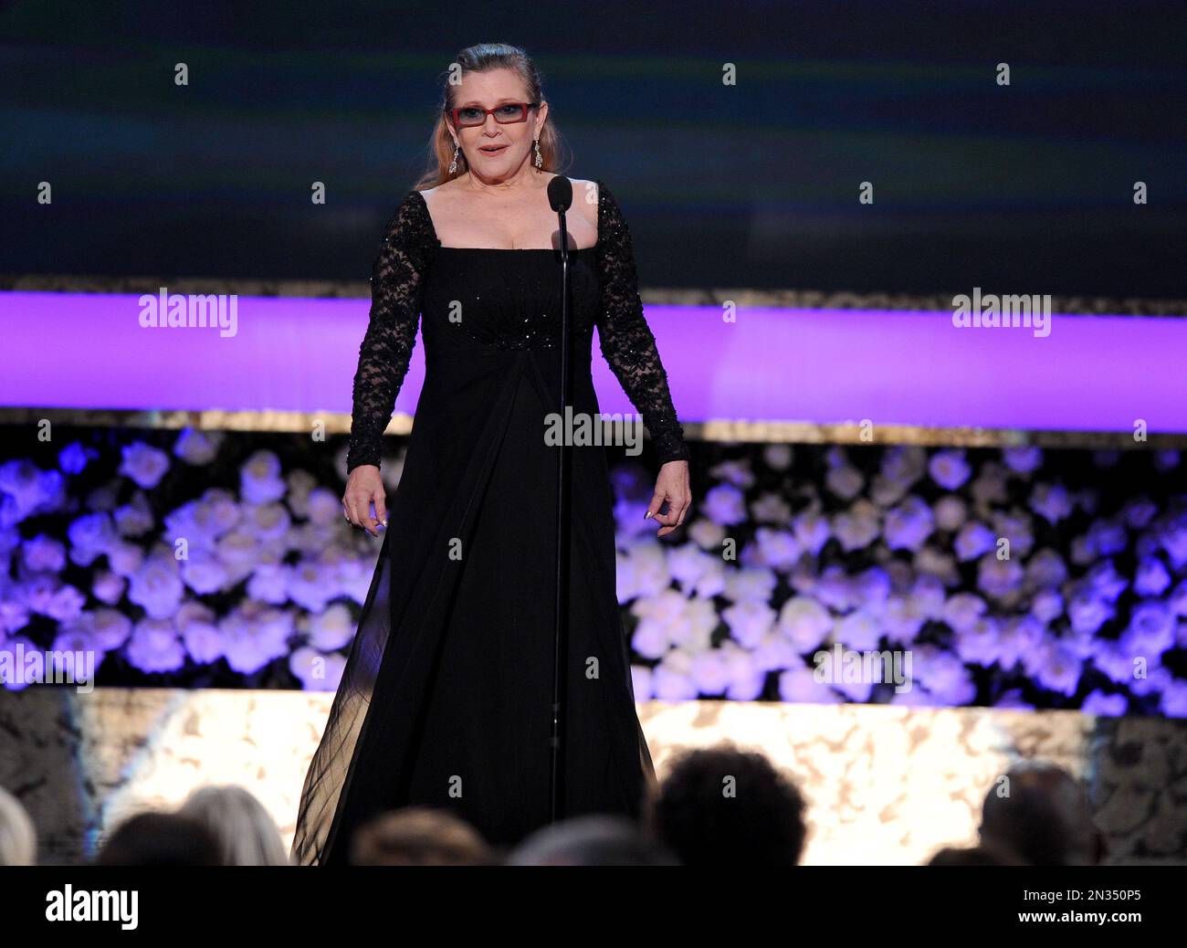 Carrie Fisher presents the life achievement award on stage at the 21st ...
