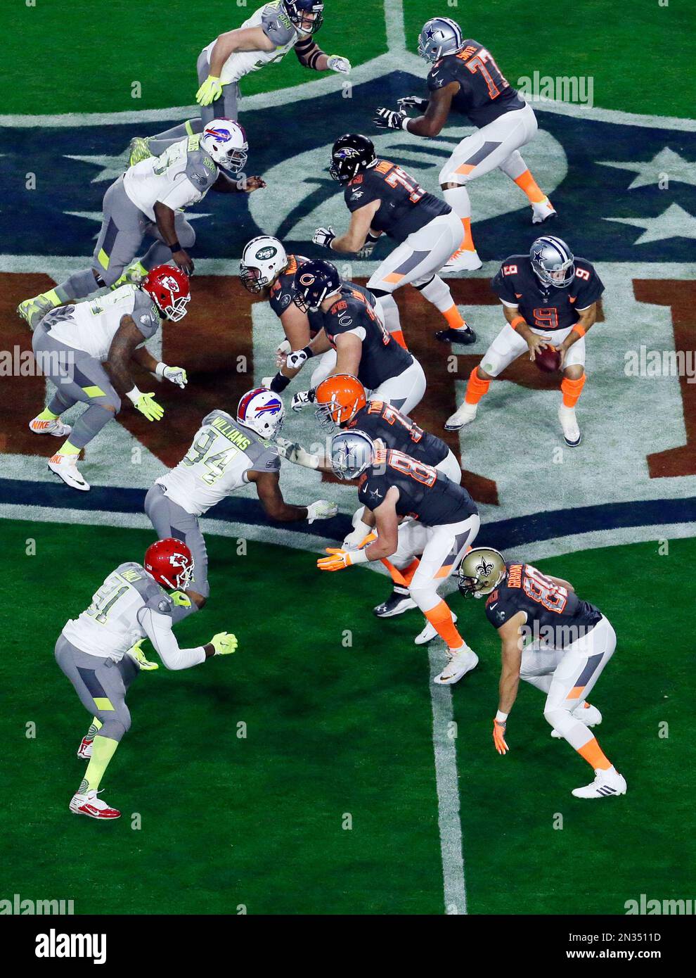 Dallas Cowboys' Tony Romo drops back to pass during the first half of ...