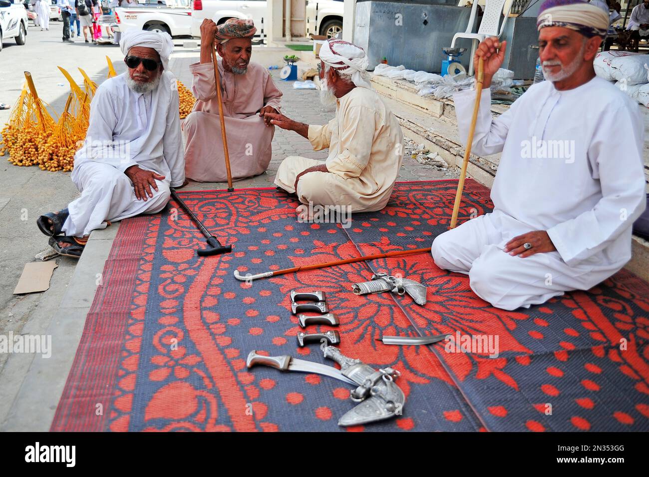 Khanjars on display at the gun market in Nizwa, Oman - Men in ...