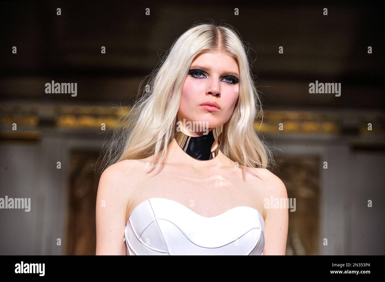 A model presents a creation by Italian fashion designer Donatella ...