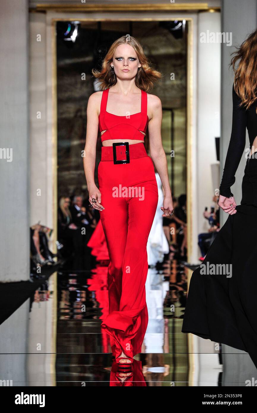 A model presents a creation by Italian fashion designer Donatella ...