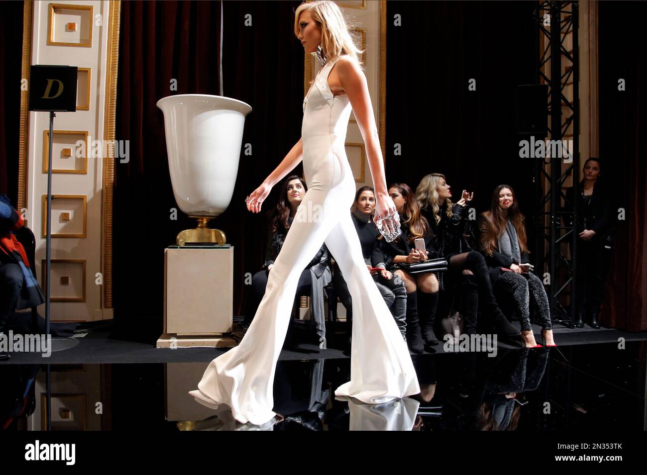 A model presents a creation by Italian fashion designer Donatella ...