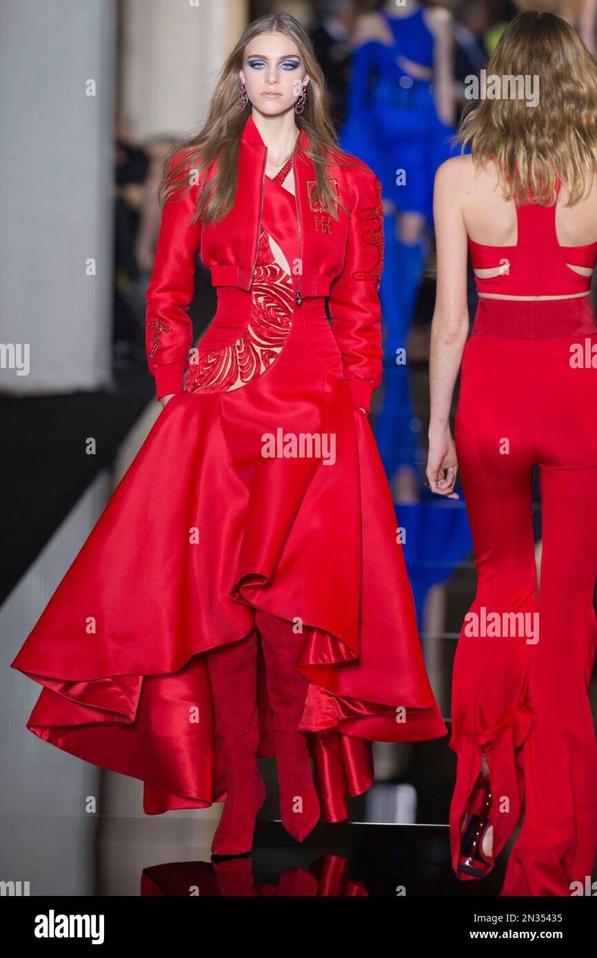 A model presents a creation by Italian fashion designer Donatella ...