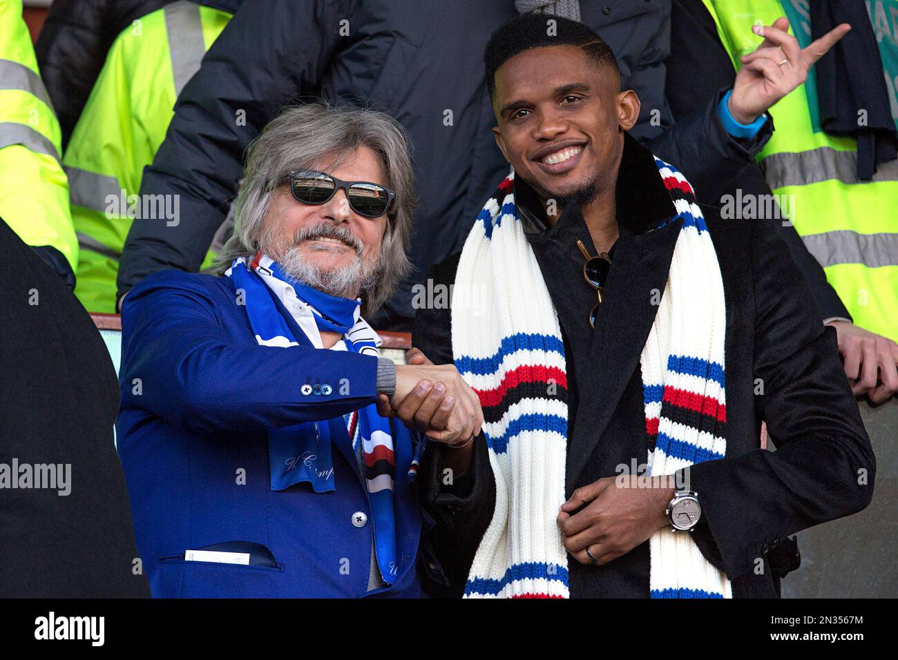 Samuel Eto'o, right, poses with Sampdoria President Massimo Ferrero as ...