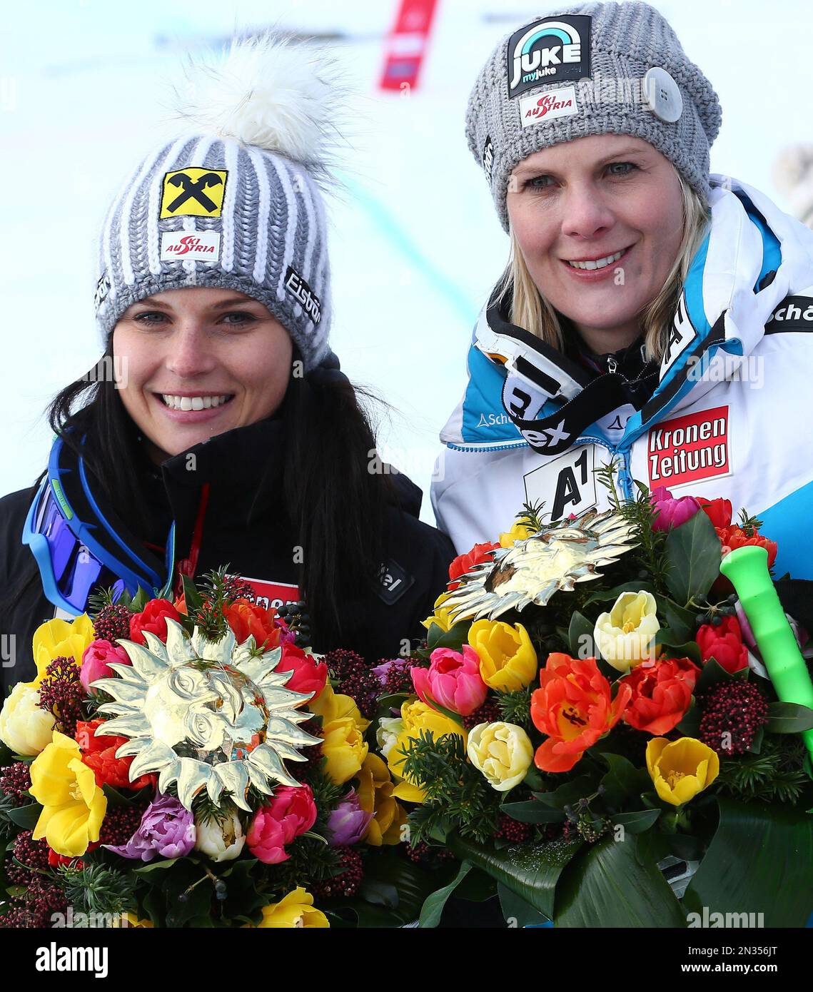 Anna Fenninger, left, and Nicole Hosp pose after completing an alpine ...