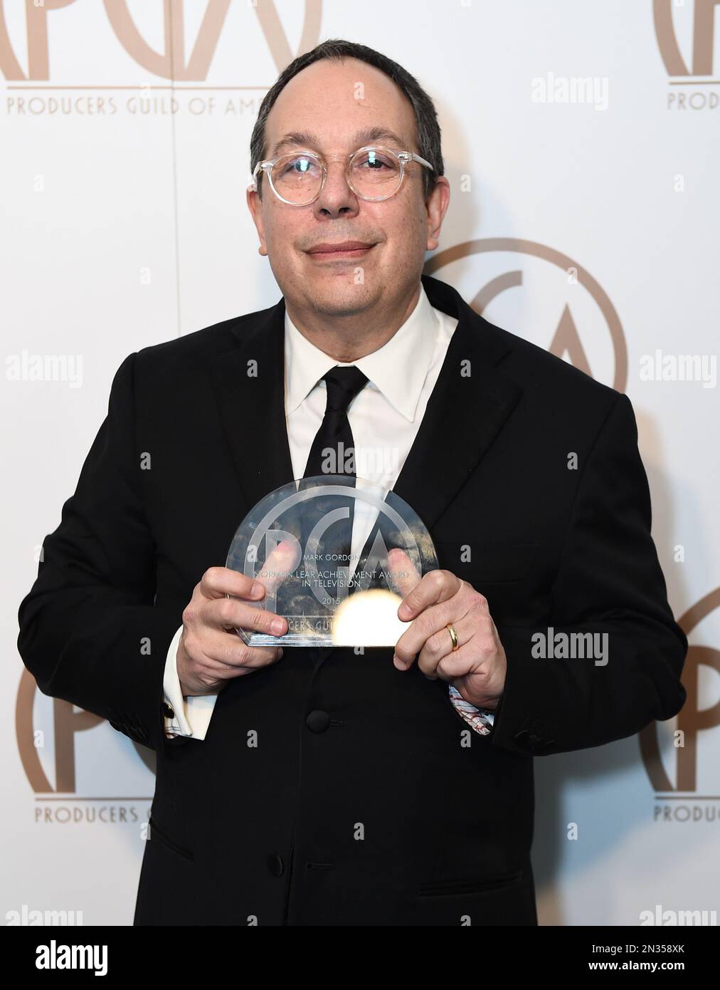 EXCLUSIVE - Mark Gordon poses with the Norman Lear Achievement Award in ...