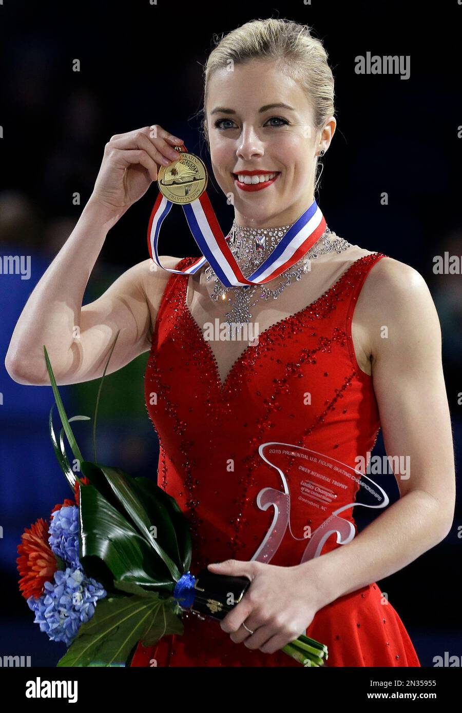 Ashley Wagner holds her medal during the awards ceremony after winning ...