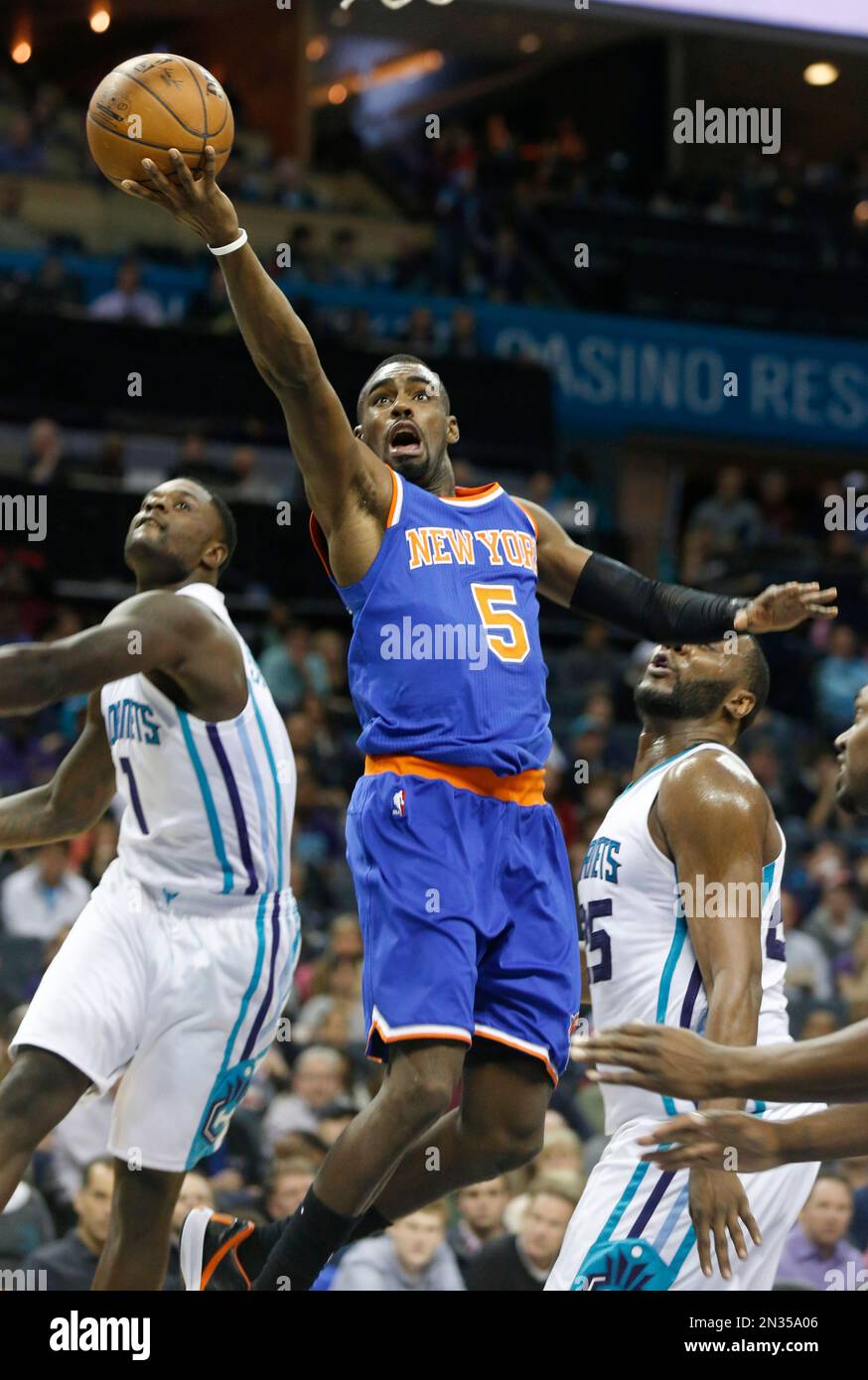 New York Knicks guard Tim Hardaway Jr (5) scores as he drives past ...