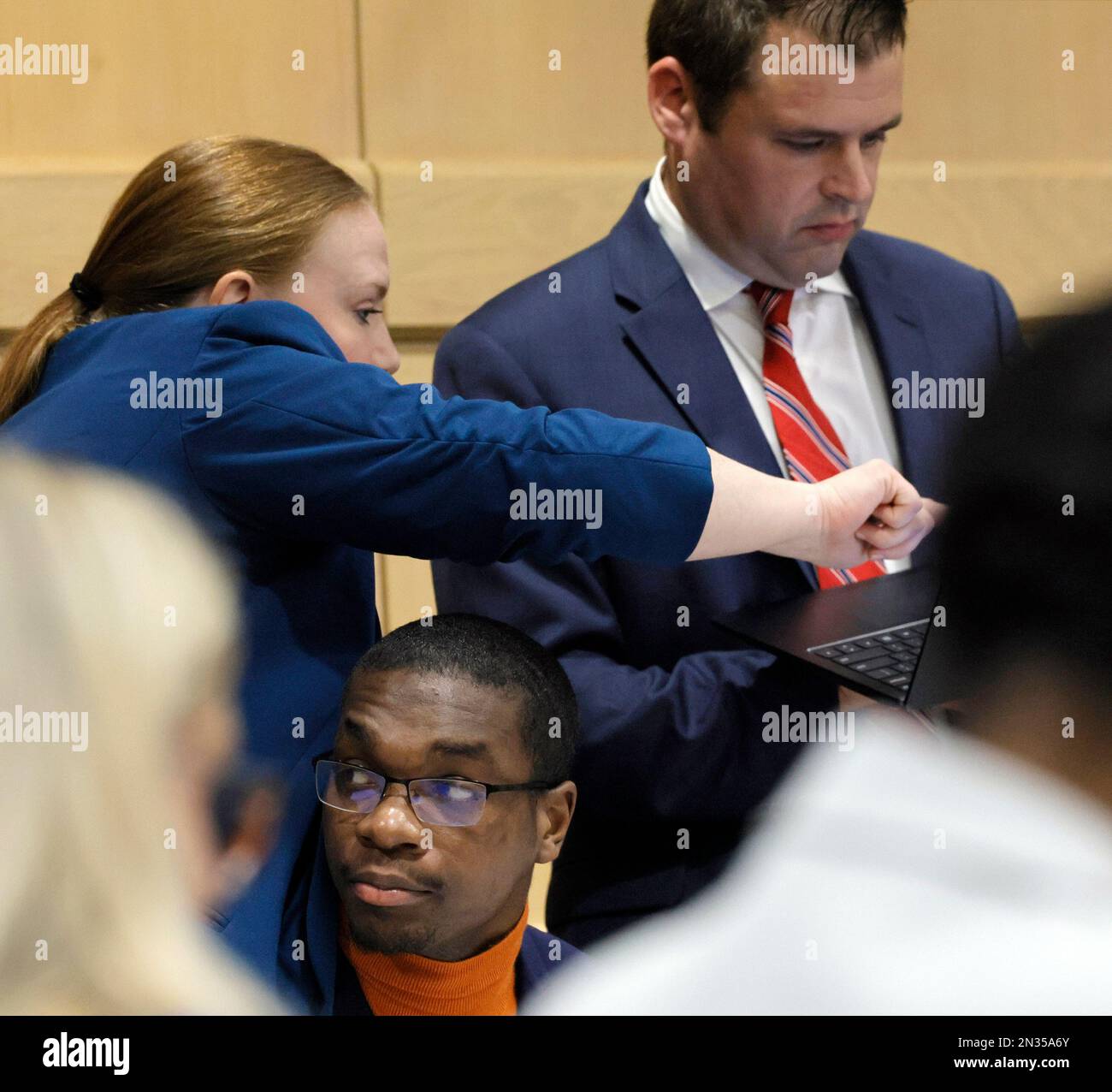 Attorneys Skyler Hill, left, and Joseph Kimok confer as shooting ...