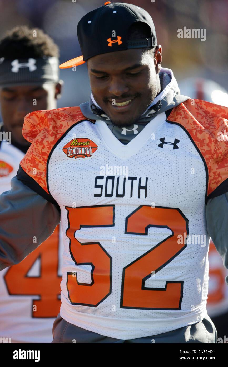 South inside linebacker Denzel Perryman of Miami (52) walks onto the ...