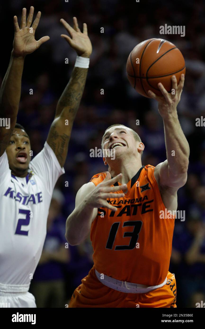 Oklahoma State guard Phil Forte III (13) is covered by Kansas State ...
