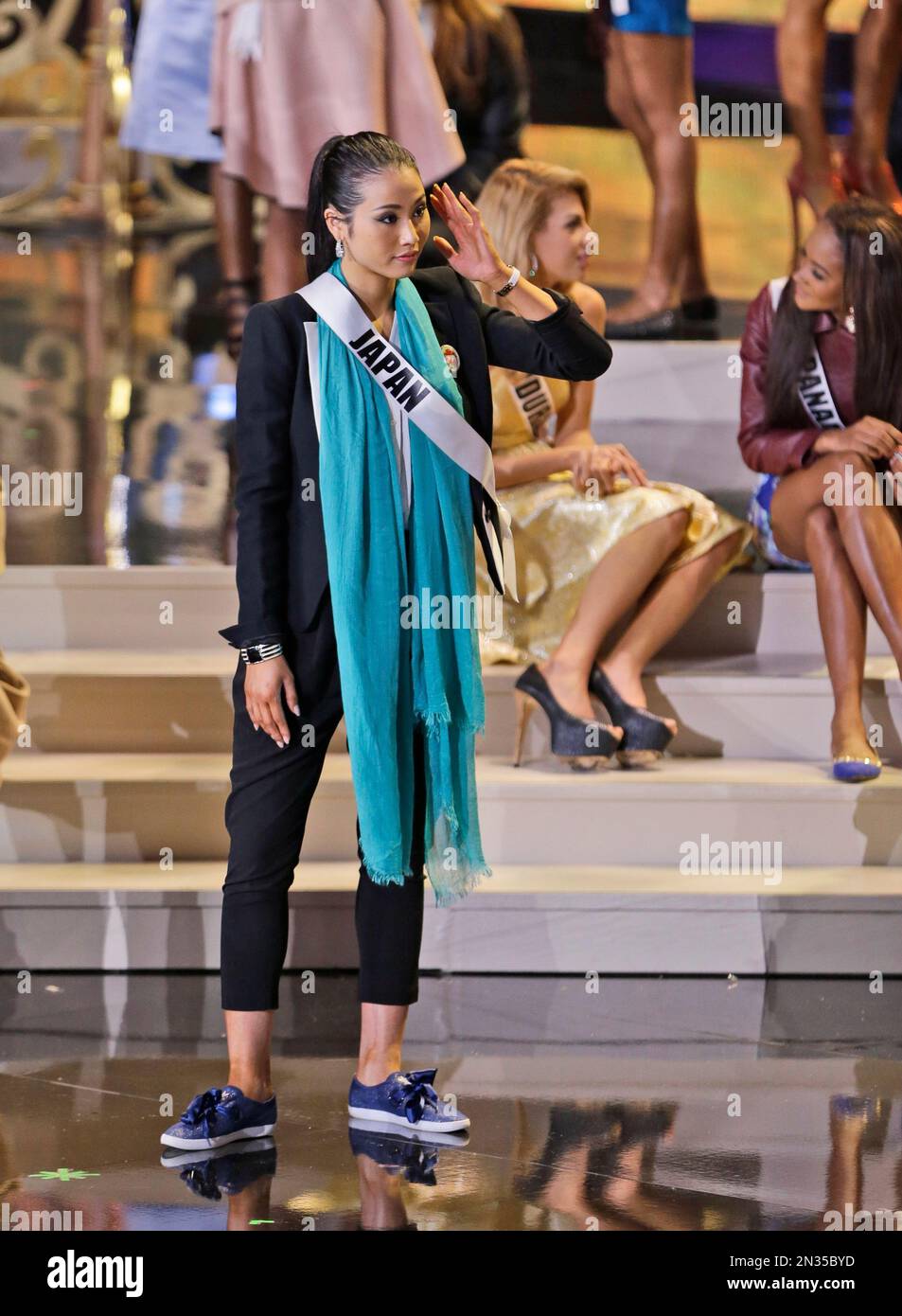 Miss Universe contestant Keiko Tsuji of Japan stands in place during a ...
