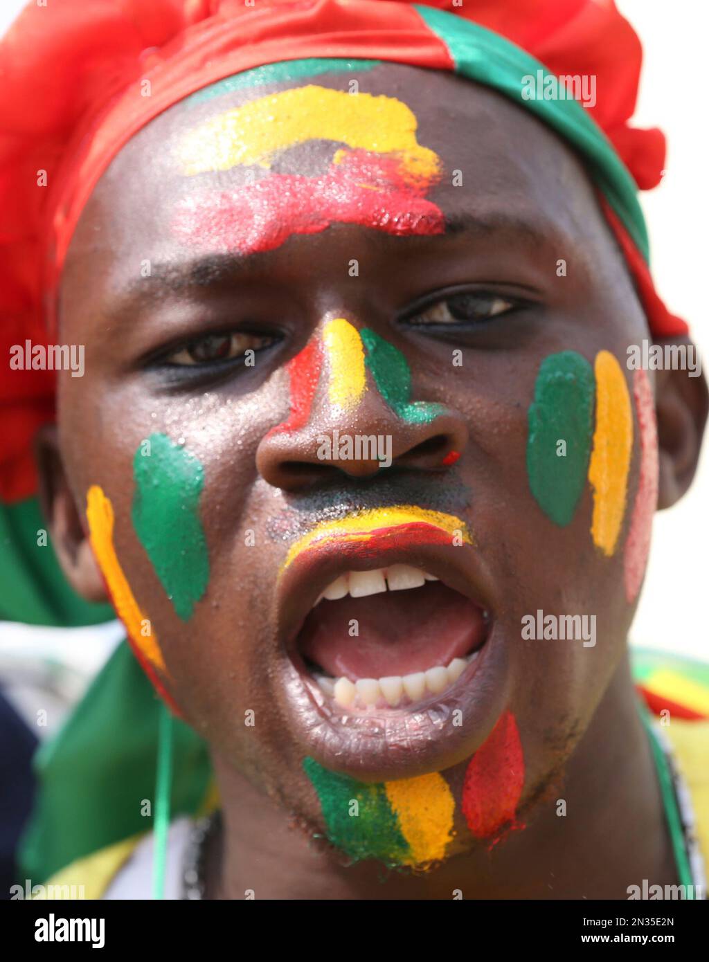 A Malian supporter chants before the African Cup of Nations Group D ...