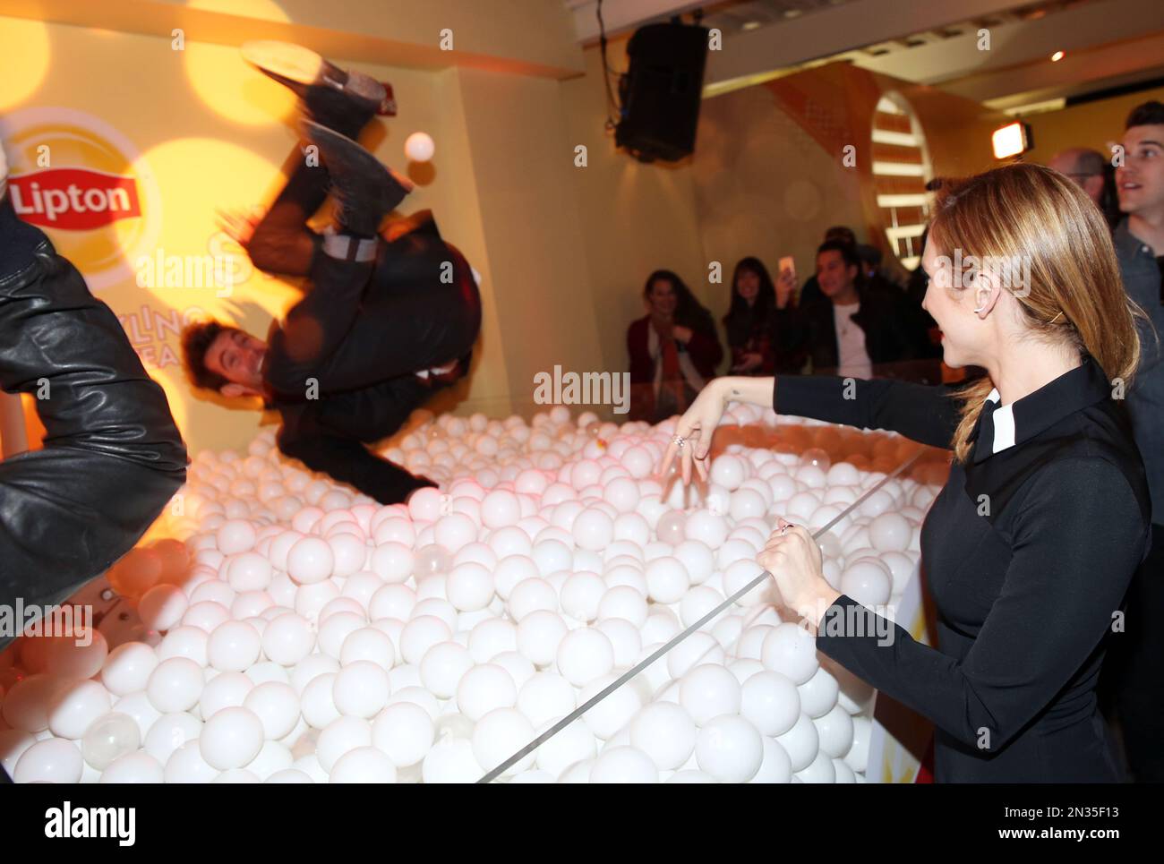IMAGE DISTRIBUTED FOR LIPTON - Actress Brittany Snow, right, throws a ...