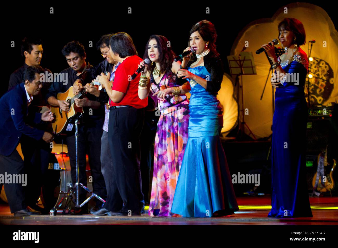 In this Friday, Jan. 23, 2015 photo, Myanmar singer Connie, third from ...