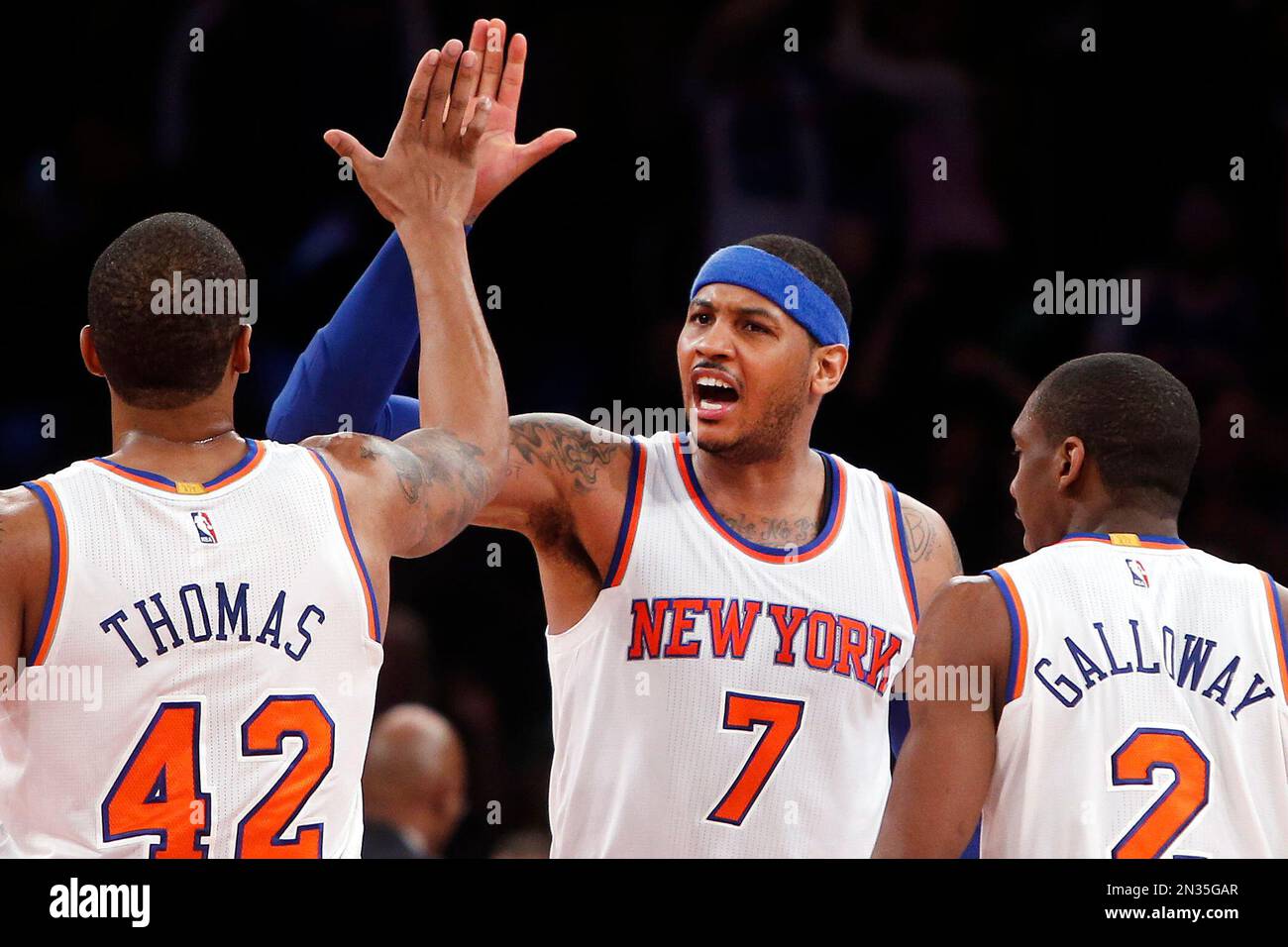 New York Knicks' Carmelo Anthony (7) celebrates with teammates Lance ...