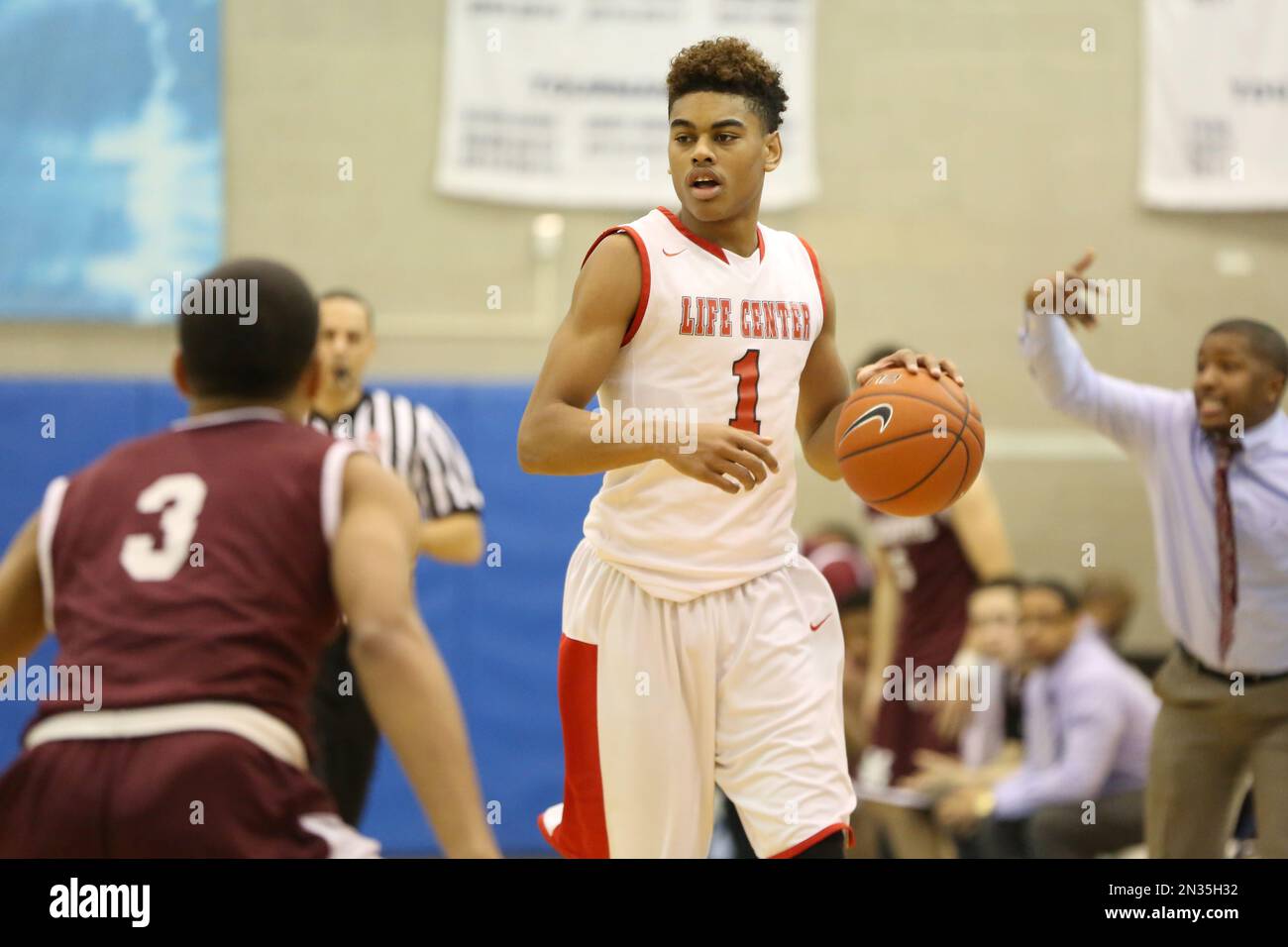 Life Center's Malik Ellison #1 in action against MacDuffie during their ...